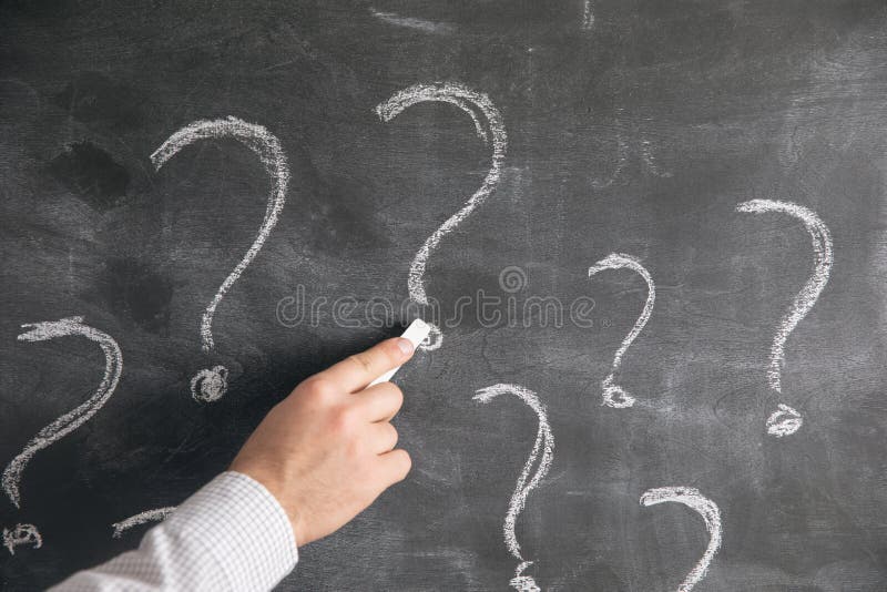 Writes a Question Mark in Chalk on a Blackboard Stock Photo - Image of ...