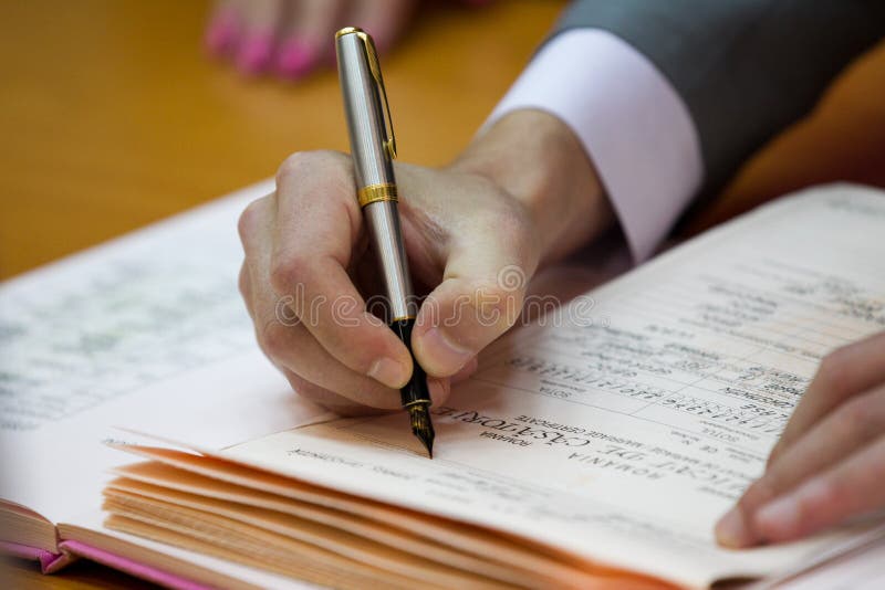 Writing stock image. Image of paper, hand, silver, skin - 20830563