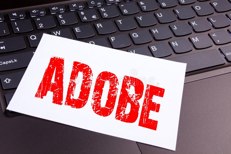 Writing ADOBE Text Made in the Office Close-up on Laptop Computer ...