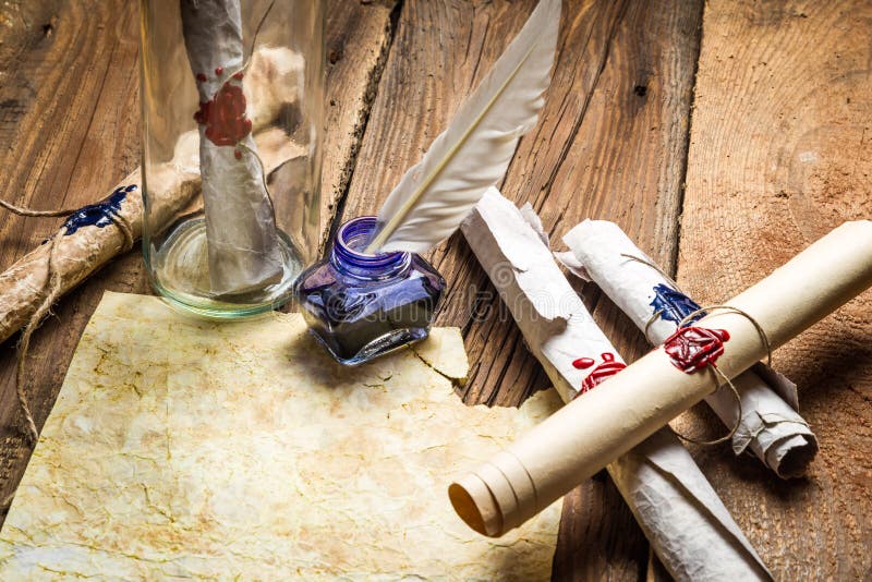 Writing Ancient Feather Letter and Send it in a Bottle Stock Photo ...