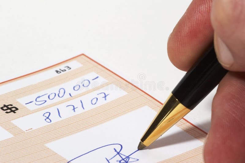 Writing a bank check stock photo. Image of cheque, hand - 1761998