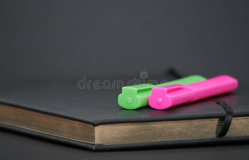 Writing Book with Green and Orange Markers Stock Photo - Image of macro ...