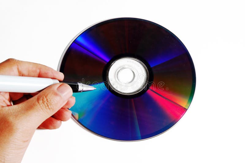 Man s hand writing on DVD stock image. Image of disc - 15567073