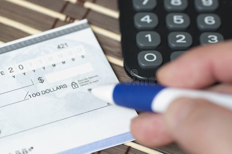 Writing check stock photo. Image of hands, corporation - 20386528