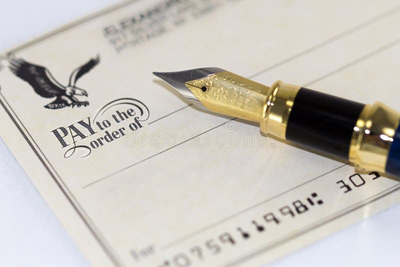 Writing a check stock photo. Image of checkbook, book - 26533074