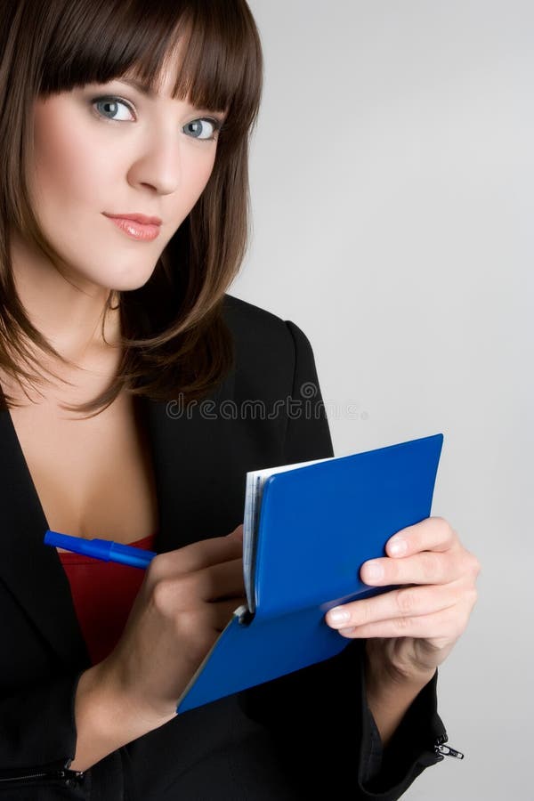 Businesswoman Writing Check Stock Image - Image of ethnic, facial: 9588065
