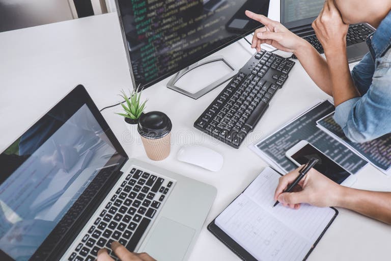 Writing Codes and Typing Data Code Technology, Programmer Cooper Stock ...