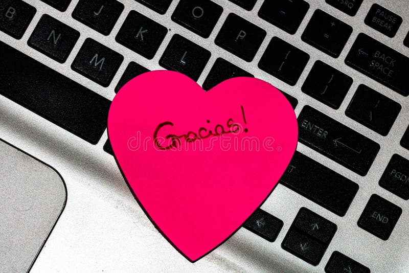 Writing on Colorful Sticky Note Gracias. Text with Gracias on Paper ... Writing on Colorful Sticky Note Gracias. Text with Gracias on Paper ...