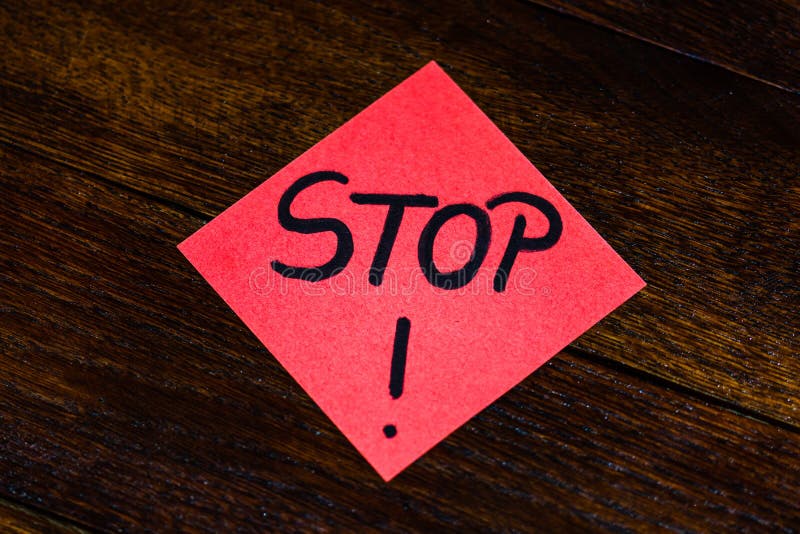 Writing on Colorful Sticky Note STOP. Text with Stop on Paper Stock ...