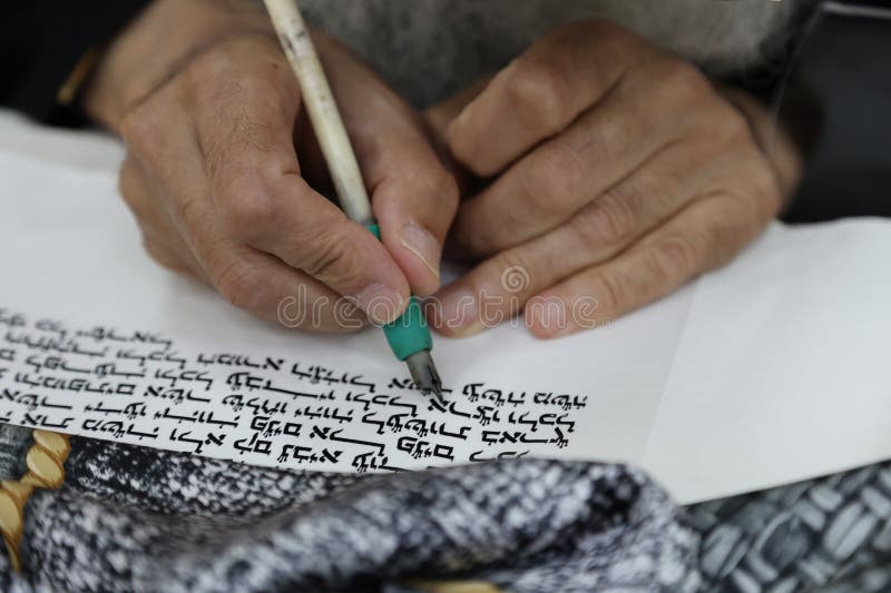 Writing and Correcting the Last Letters of a Torah Scroll, Stock Photo ...