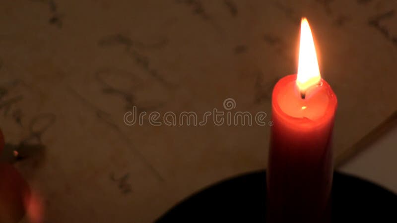 Writing by candlelight 3 stock footage. Video of craft - 346551196