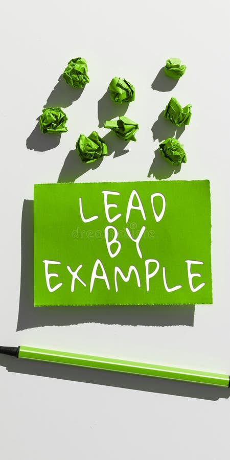 Writing Displaying Text Lead by Example. Word Written on Be a Mentor ...