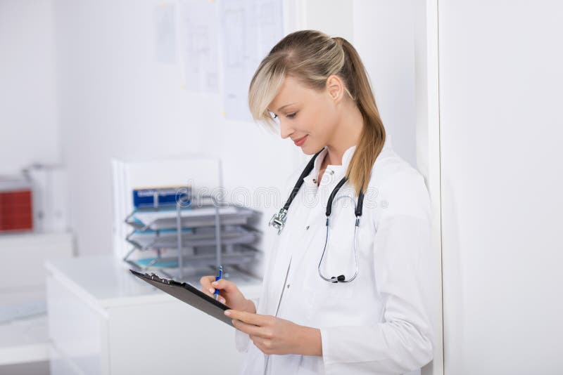 Writing doctor stock image. Image of paper, attractive - 31807143