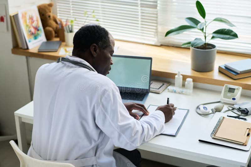 Writing Doctor Wearing White Coat in Office Stock Photo - Image of ...