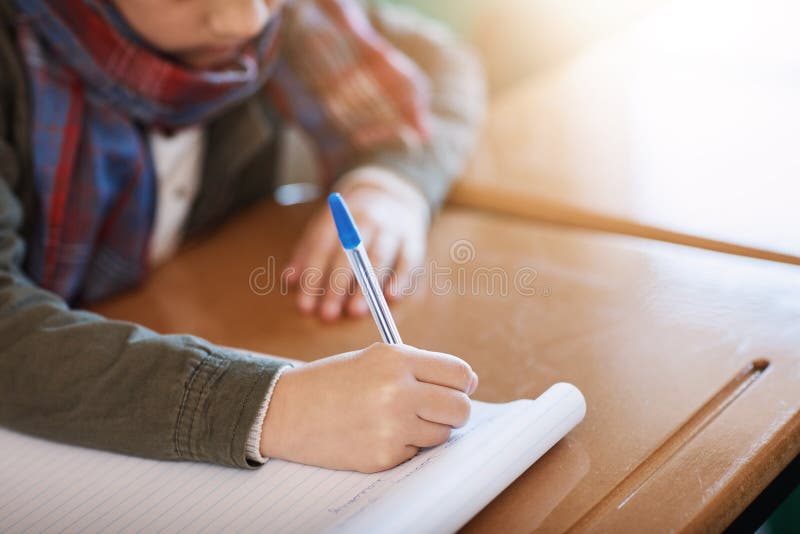 Writing Down Her Dreams. an Unrecognizable Elementary School Girl ...