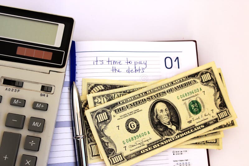 Writing Down in a Notebook about a Debt Stock Image - Image of currency ...