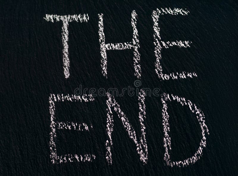 Writing the End in Chalk on a Rough Black Board To Indicate the End of ...
