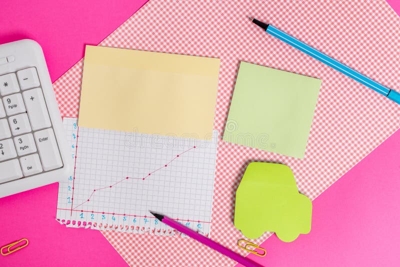 Writing Equipments and Computer Stuffs Plus Mathematic Paper Placed on ...