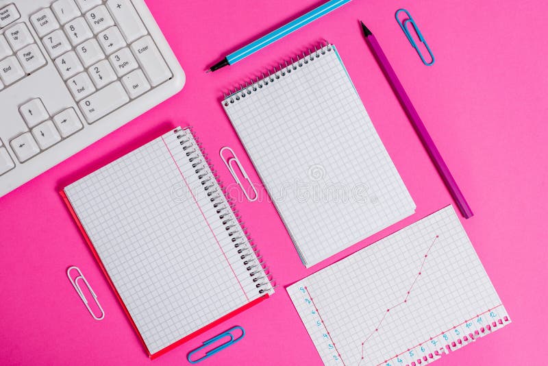 Writing Equipments and Computer Stuffs Plus Mathematic Paper Placed on ...