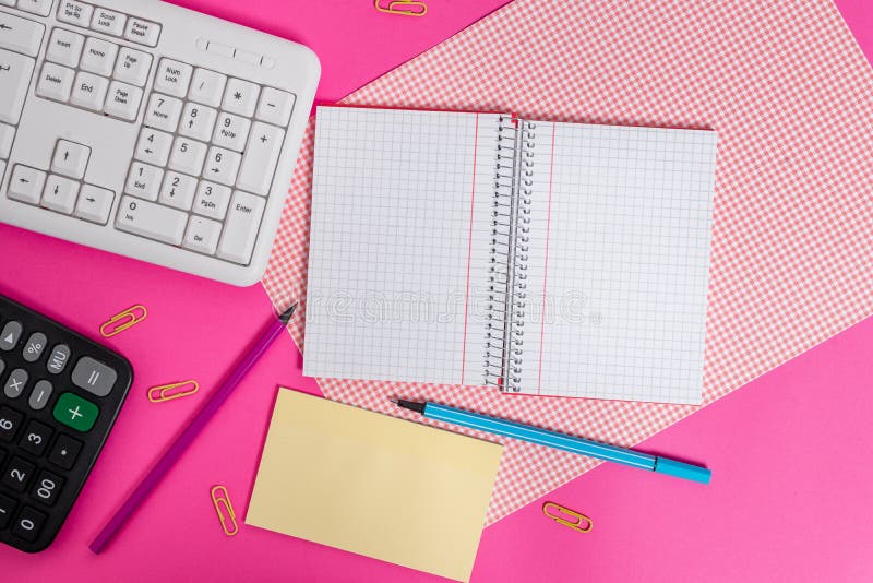 Writing Equipments and Computer Stuffs Plus Mathematic Paper Placed on ...