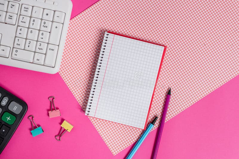 Writing Equipments and Computer Stuffs Plus Mathematic Paper Placed on ...