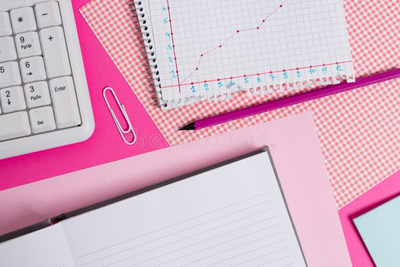 Writing Equipments and Computer Stuffs Plus Mathematic Paper Placed on ...