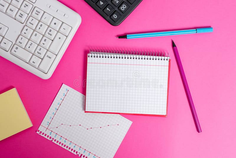 Writing Equipments and Computer Stuffs Plus Mathematic Paper Placed on ...