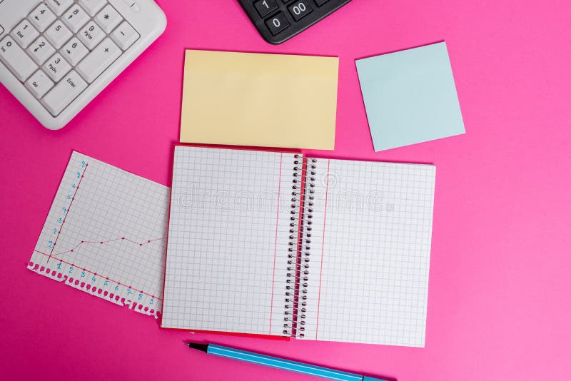 Writing Equipments and Computer Stuffs Plus Mathematic Paper Placed on ...