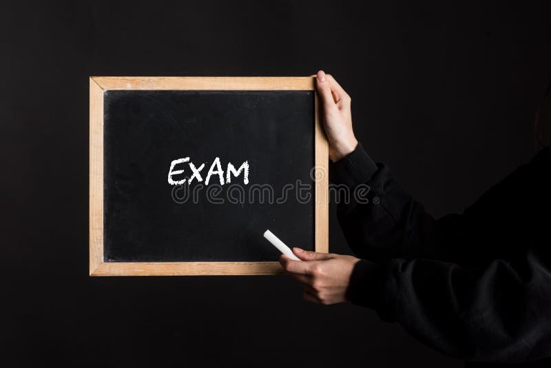 Writing an exam in school stock photo. Image of mental - 215366378
