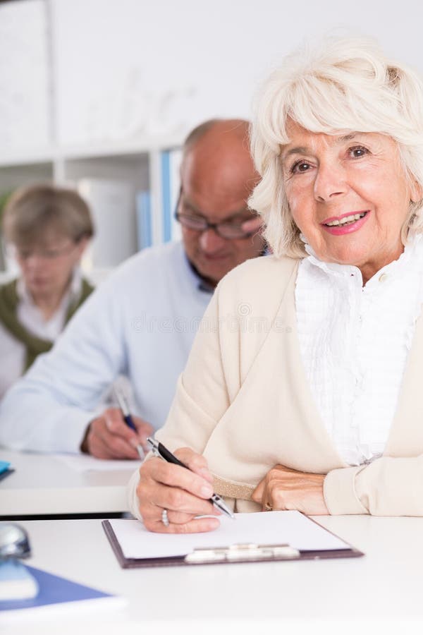 Writing an Exam at University Stock Photo - Image of school, seminar ...