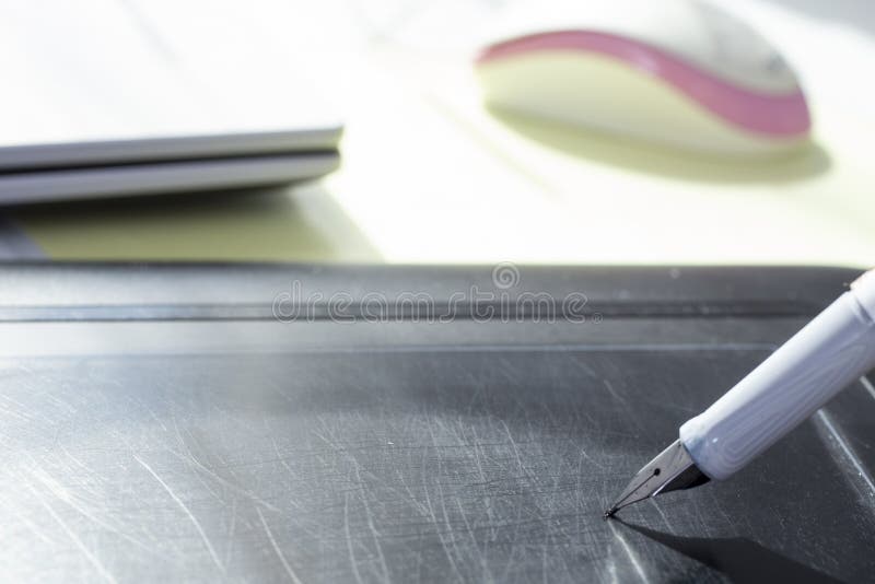 Writing with a Fountain Pen on a Graphic Tablet, with Scratches on the ...