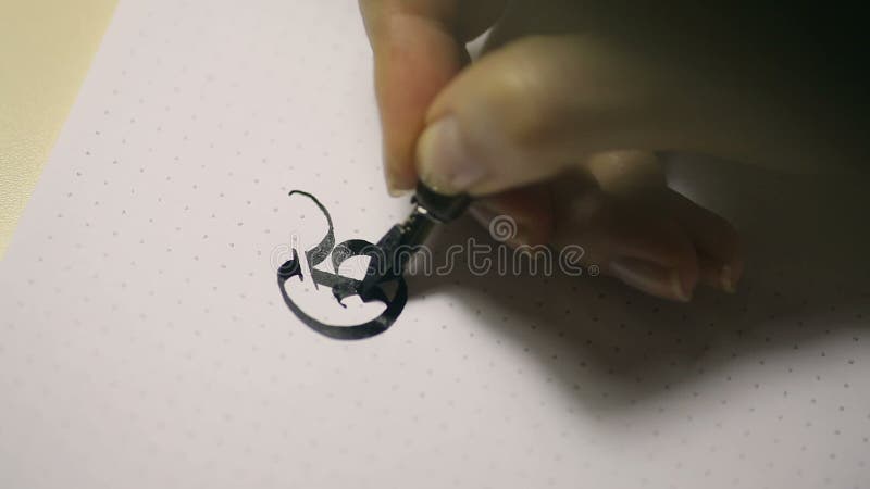 Writing Gothic Calligraphy. Female Hand Writes with Ink Pen Stock Video ...