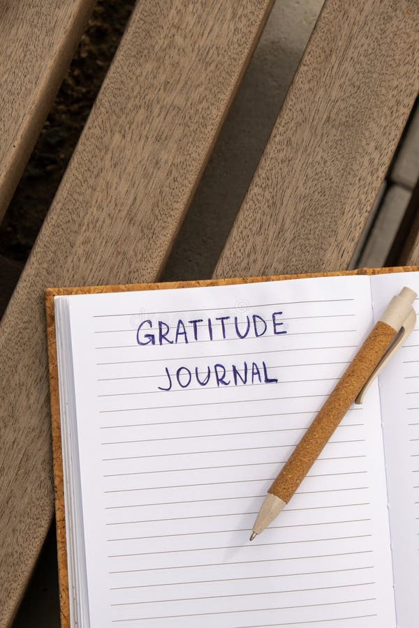 Writing Gratitude Journal on Wooden Bench. Today I am Grateful for ...