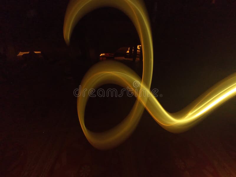 Writing the Letter a Using Light Painting Techniques, with Yellow ...