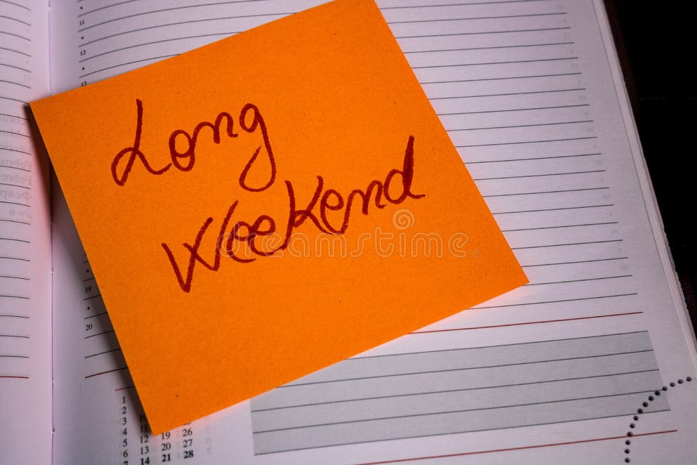 Writing Long Weekend on Memo Post Reminder. Text Long Weekend on Sticky ...