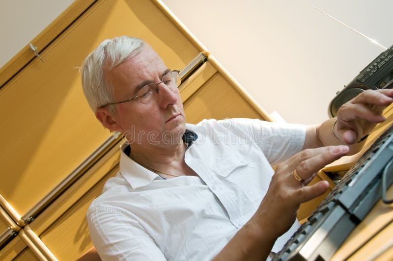 Mailman Making a Delivery of Letters To a Mailbox Stock Photo - Image ...