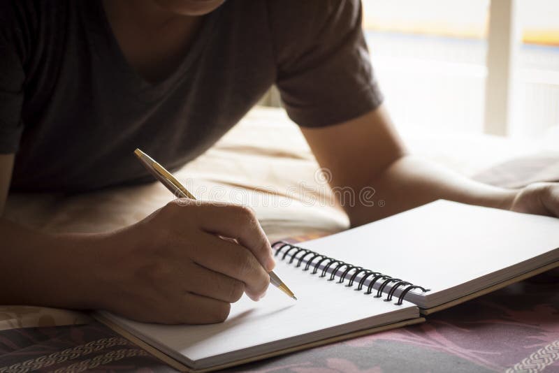 Writing on notebook stock photo. Image of women, note - 100433288