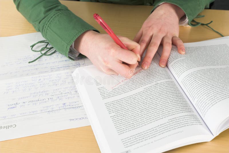 Writing notes during class stock image. Image of hands - 537459