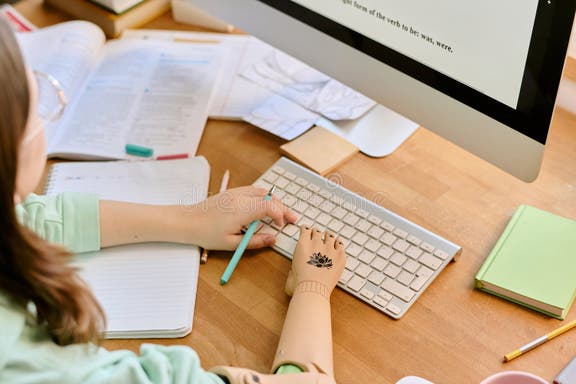 Writing Notes and Studying at Computer Desk Stock Photo - Image of ...