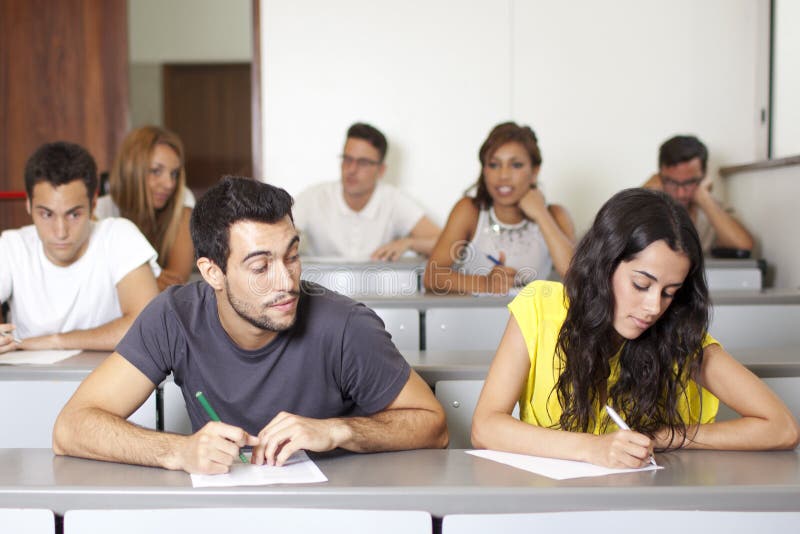 Students Writing an Exam in Class Room Stock Image - Image of people ...