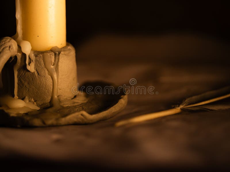 Writing Quill on Parchment by Candlelight Stock Image - Image of dark ...