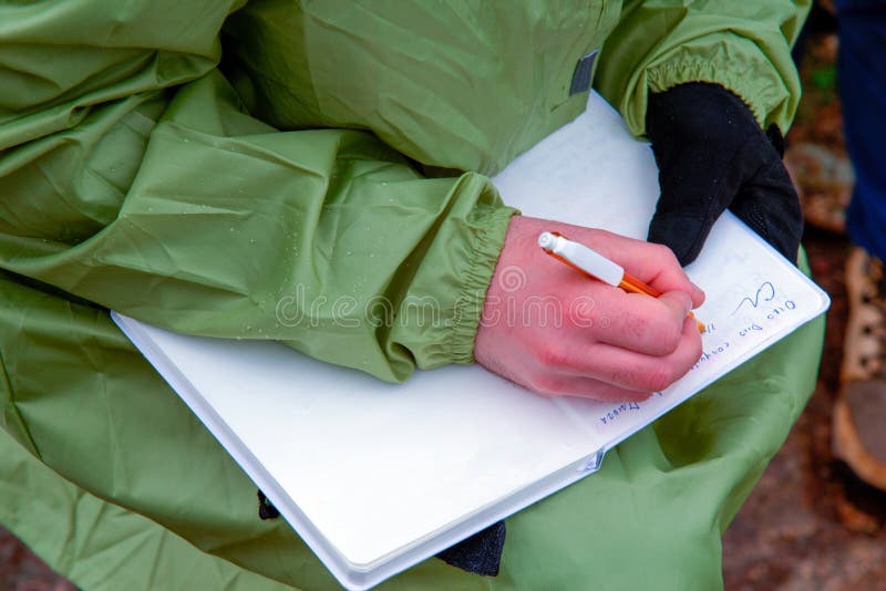 Writing in the rain stock image. Image of male, green - 218106061