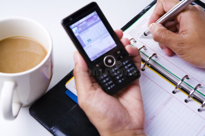 Writing Schedule on Organizer from Phone Cell Stock Photo - Image of ...
