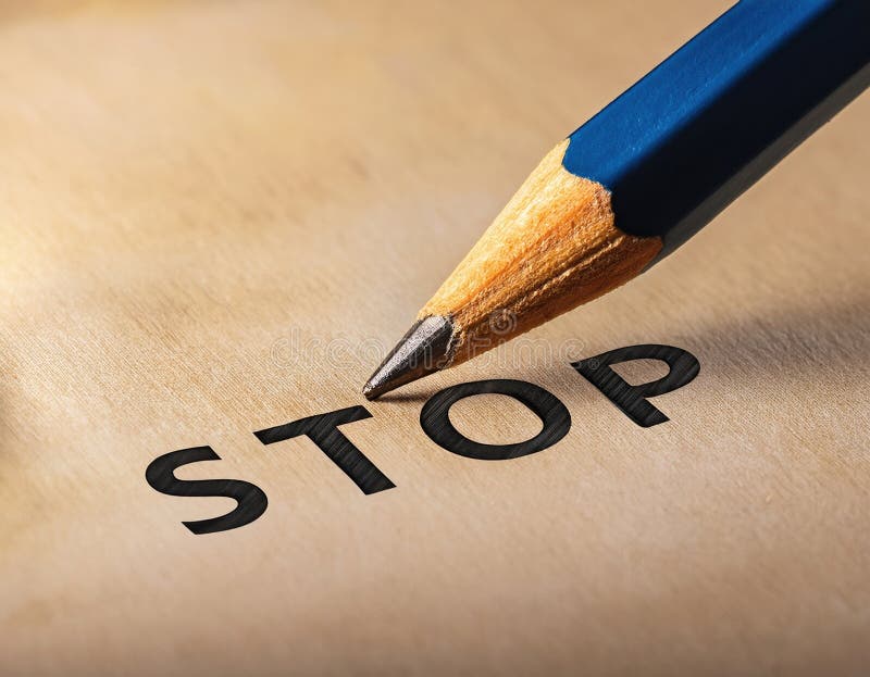 Writing a Stop Message Using a Pencil on Wooden Surface Stock ...