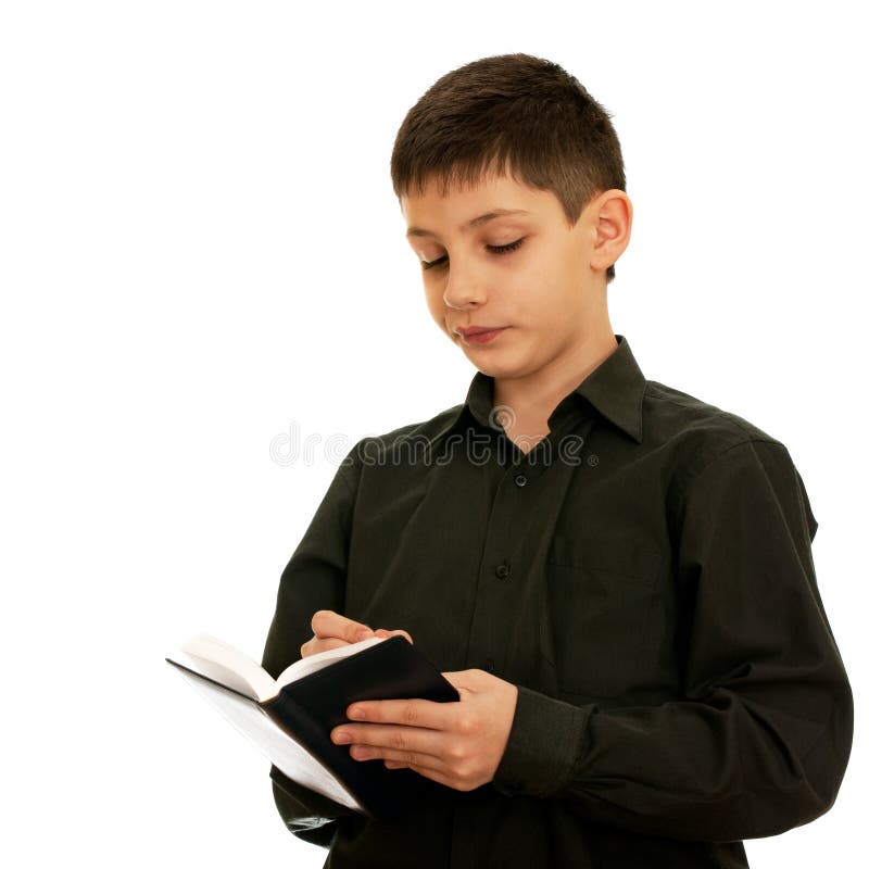 Student Writing in Notebook in School Classroom Stock Image - Image of ...