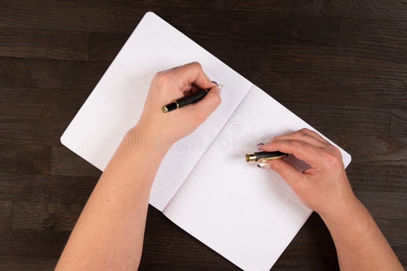 Holding a Inkpen in Left Hand Stock Image - Image of class, indoors ...