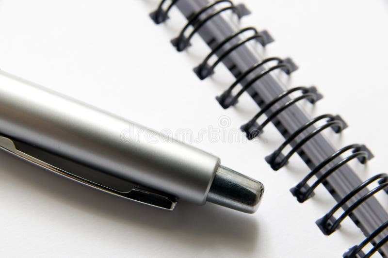 Ballpen on notebook stock photo. Image of paper, office - 517274