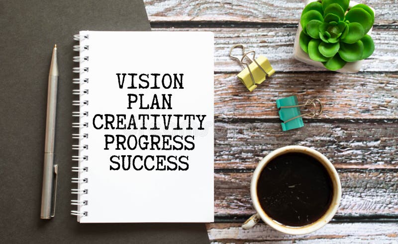 Writing Vision, Plan, Creativity, Progress, Success in a White Notebook ...