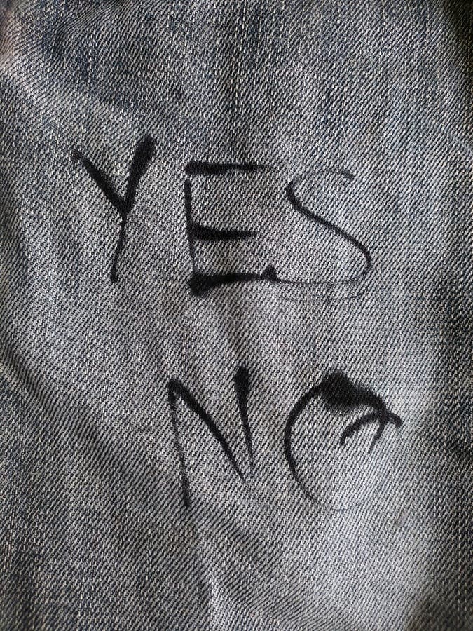 Writing Yes and No with Ink on the Jean Stock Photo - Image of note ...
