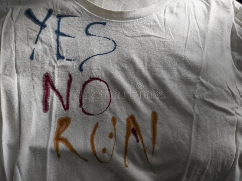 Writing Yes, No and Run on T-Shirt with Ink Stock Photo - Image of ...